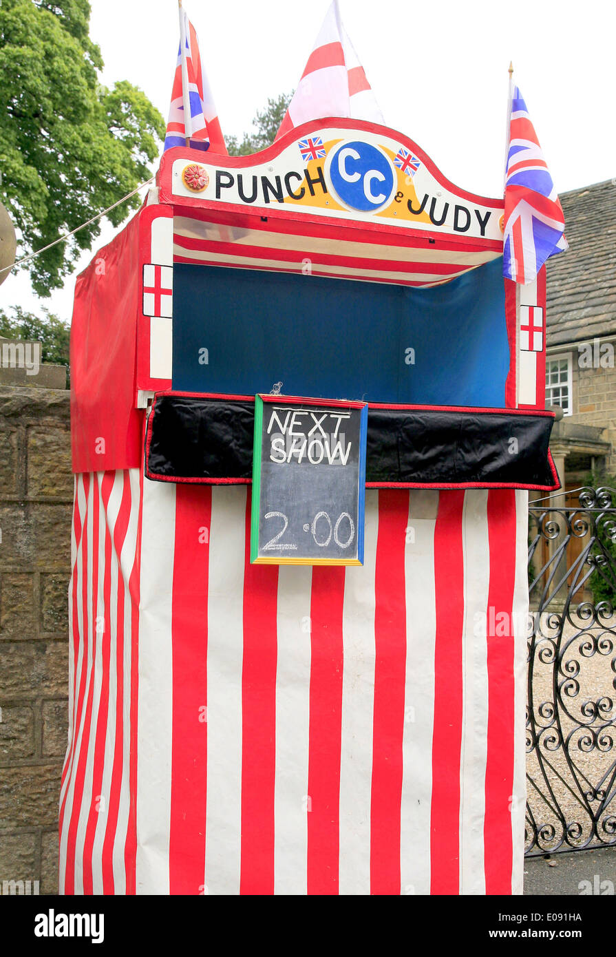 A Punch and Judy booth displaying next performance time at th Ashover ...