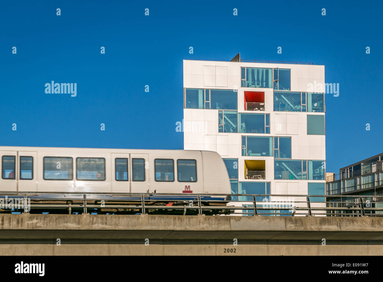 Modern buildings and a Metro line in Orestaden, Copenhagen, Denmark ...