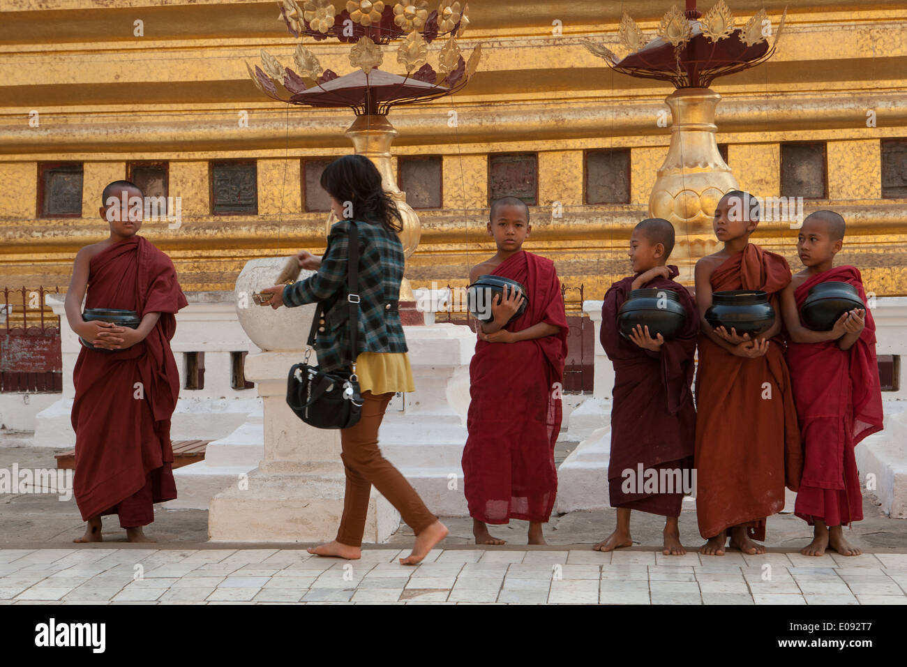Buddhist alms giving myanmar hi-res stock photography and images - Alamy
