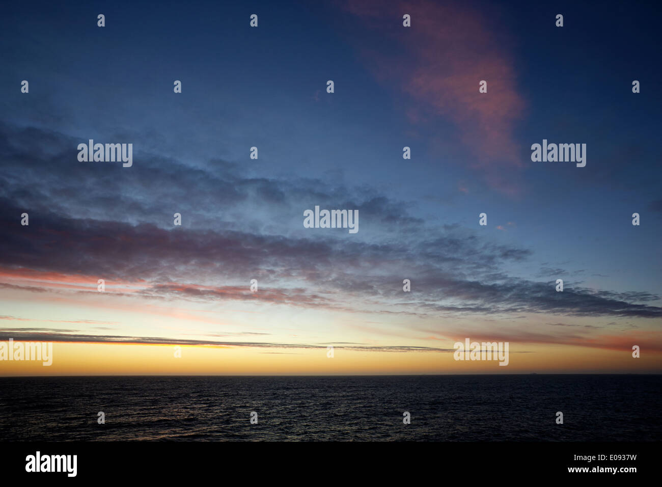 sun setting over the antarctic ocean Antarctica Stock Photo - Alamy