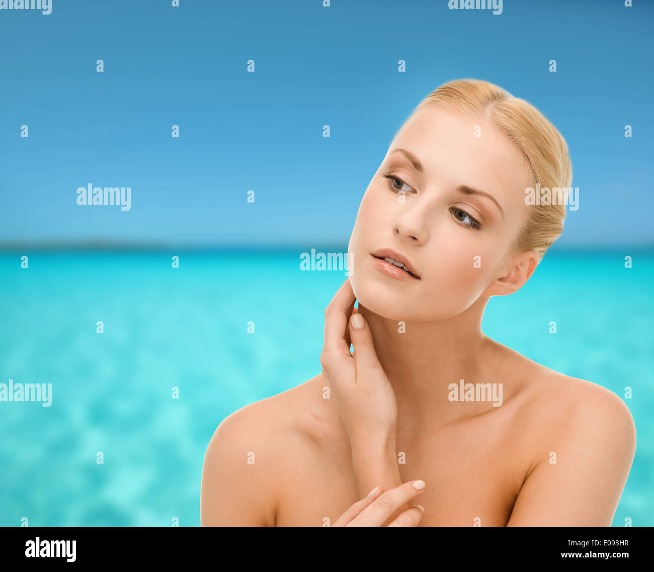 beautiful woman touching her face skin Stock Photo - Alamy