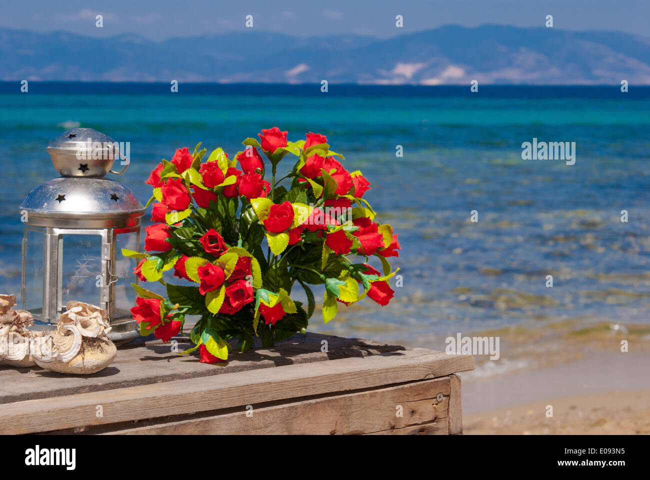 Wedding bouquet of roses on the beach Stock Photo - Alamy
