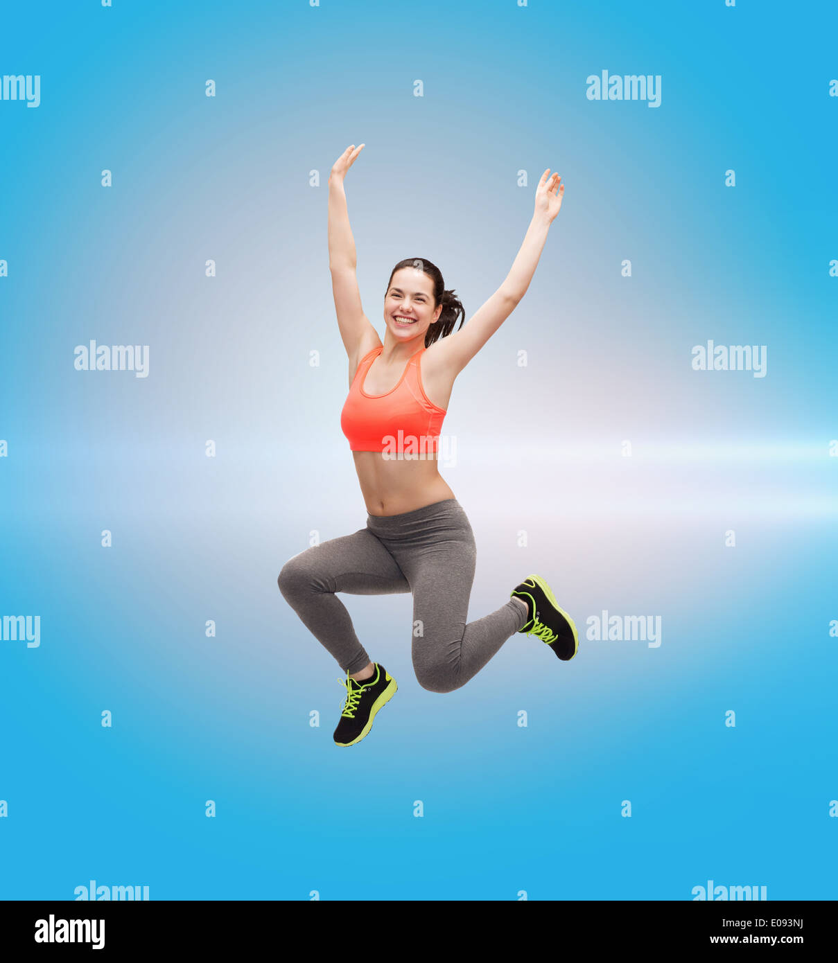 sporty teenage girl jumping in sportswear Stock Photo - Alamy