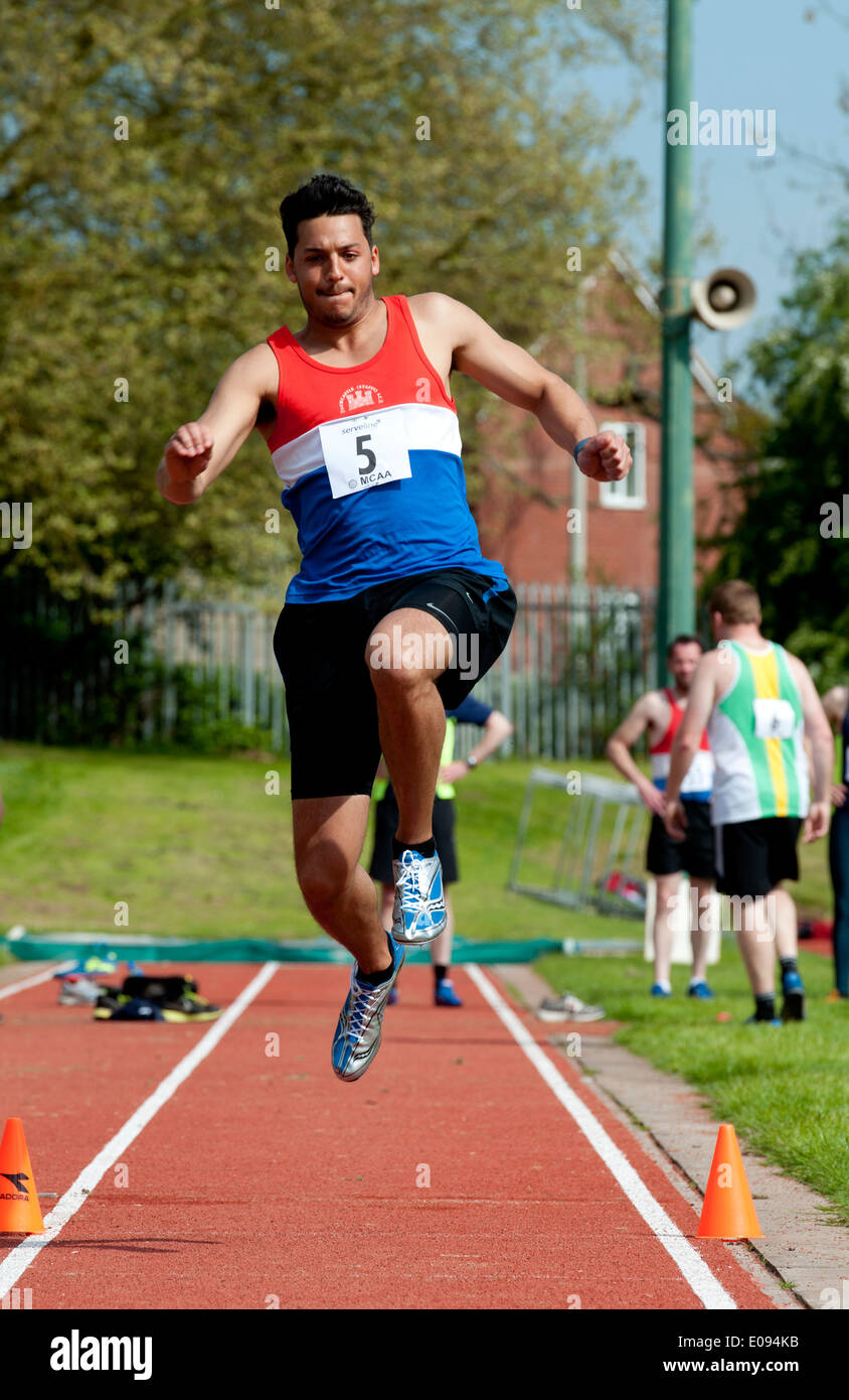Athletics, competitor in men`s triple jump competition at club level ...