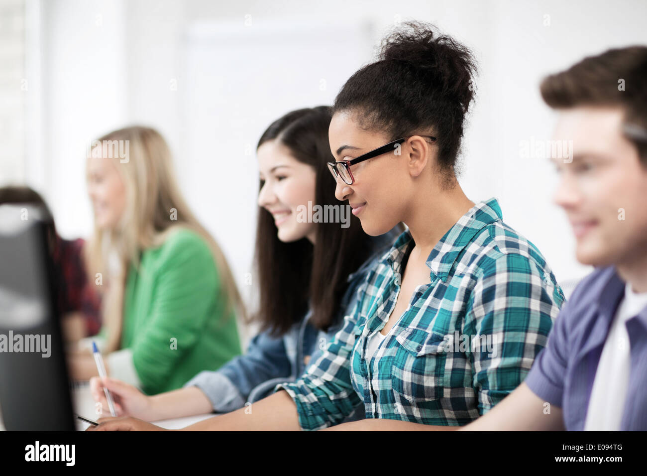 african student with computer studying at school Stock Photo - Alamy