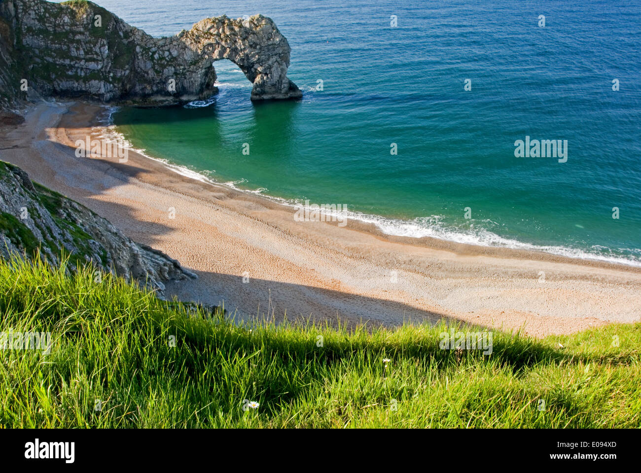 Durdle Door is an iconic sea arch created by coastal erosion on Dorset ...