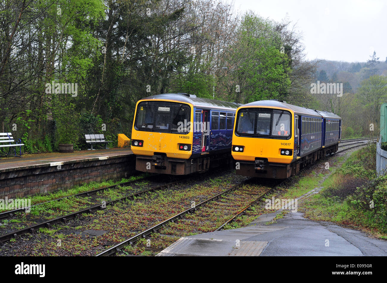 Two First Great Western Class 143 DMU trains pass each other at Eggesford station, Devon ...
