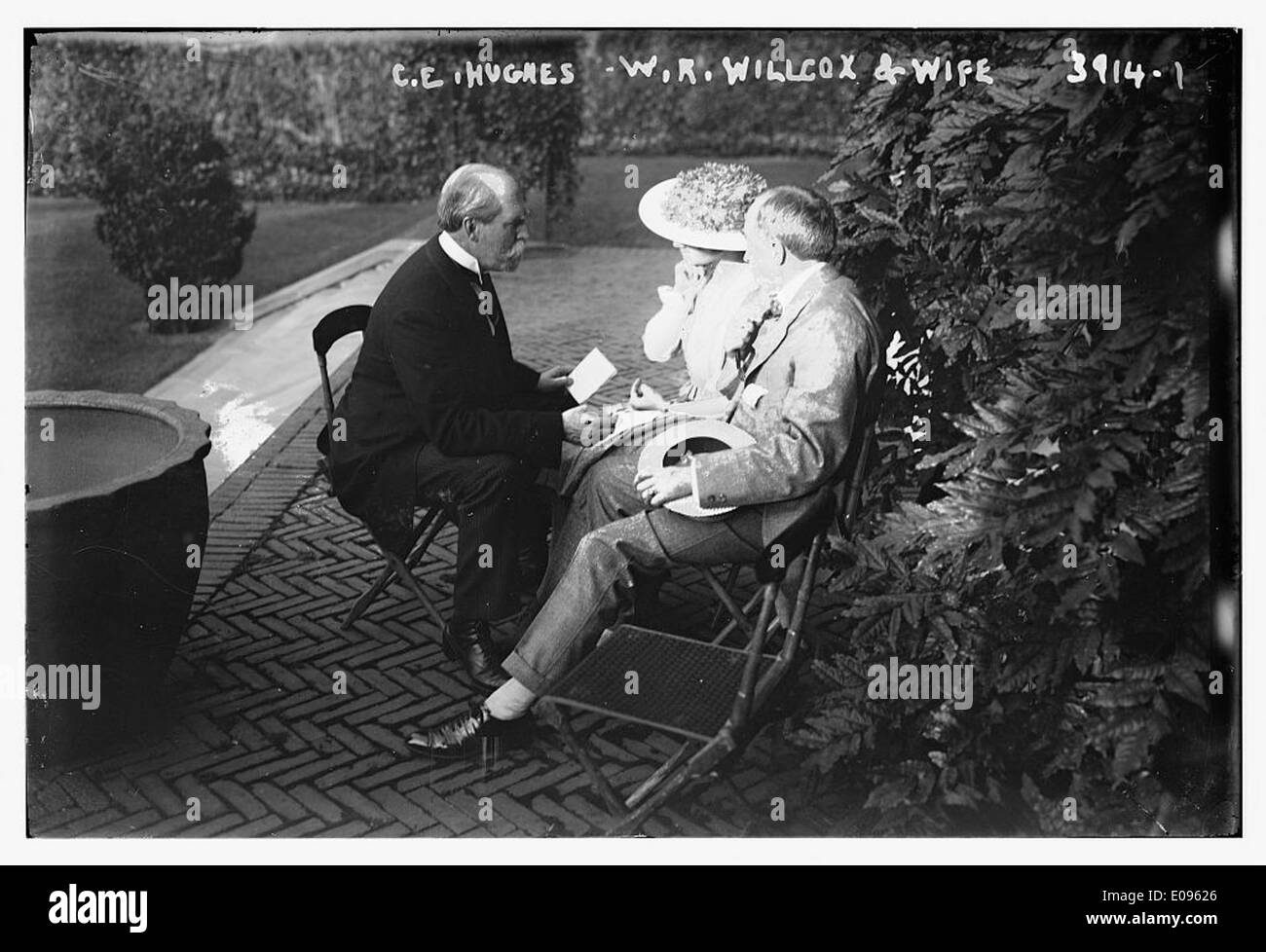 This historic photograph of C.E. Hughes, W.R. Willcox, and their wives ...