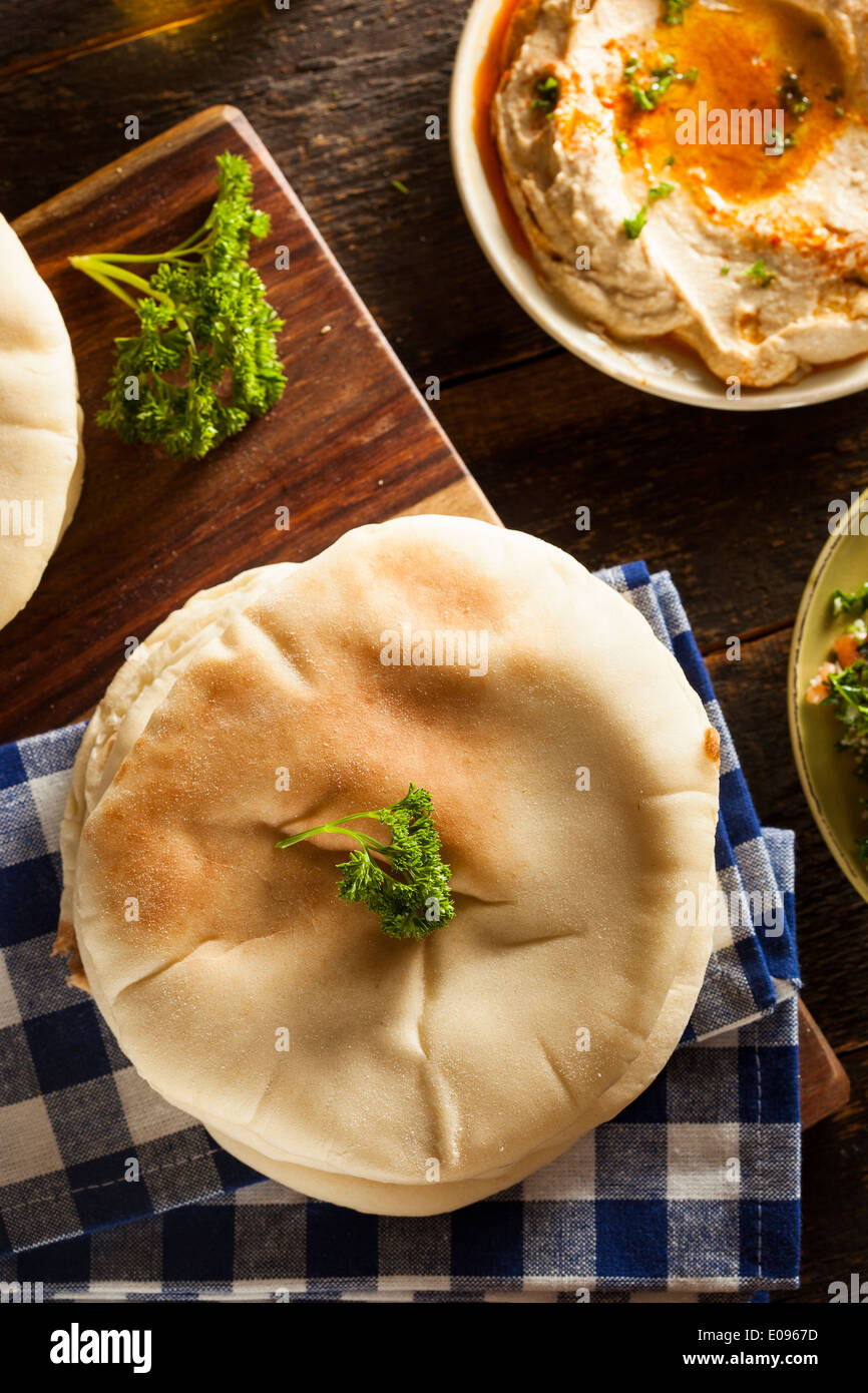 Homemade Organic Pita Bread with Hummus and Salad Stock Photo - Alamy