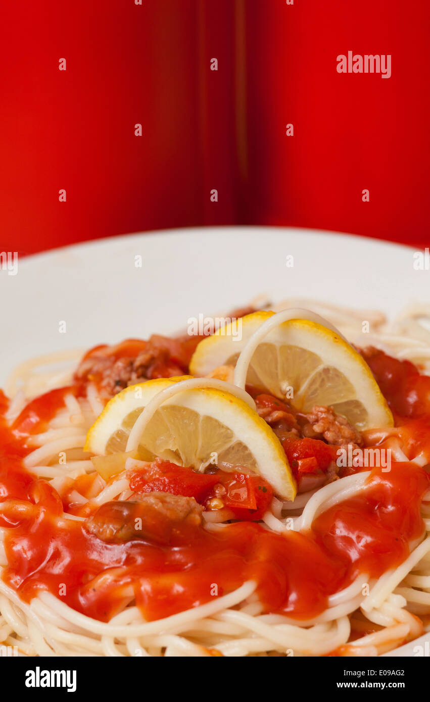 napolitan spaghetti with ketchup and lemon Stock Photo - Alamy