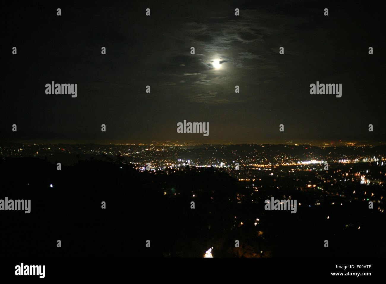 moon over a suburban valley Stock Photo - Alamy