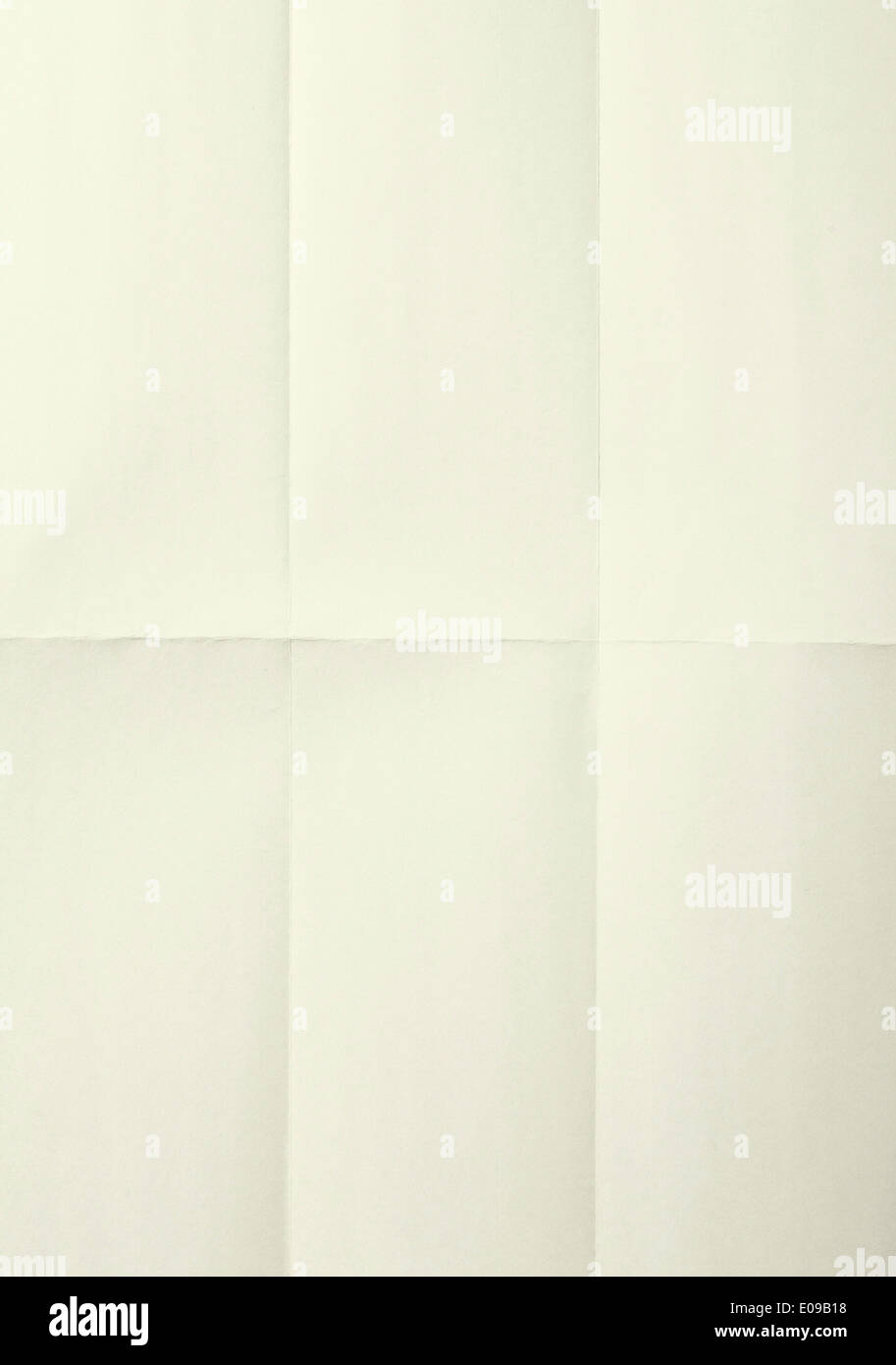 Yellow sheet of paper folded in six Stock Photo - Alamy