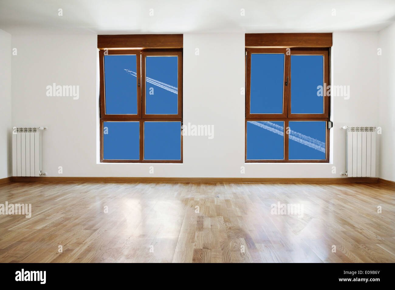 Empty interior room and two windows closed Stock Photo - Alamy