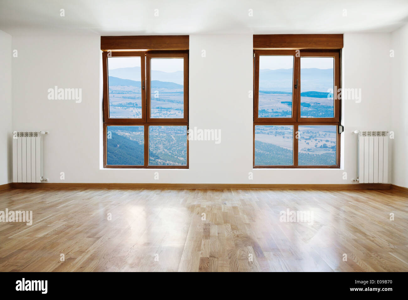 Empty interior room and two windows closed Stock Photo - Alamy