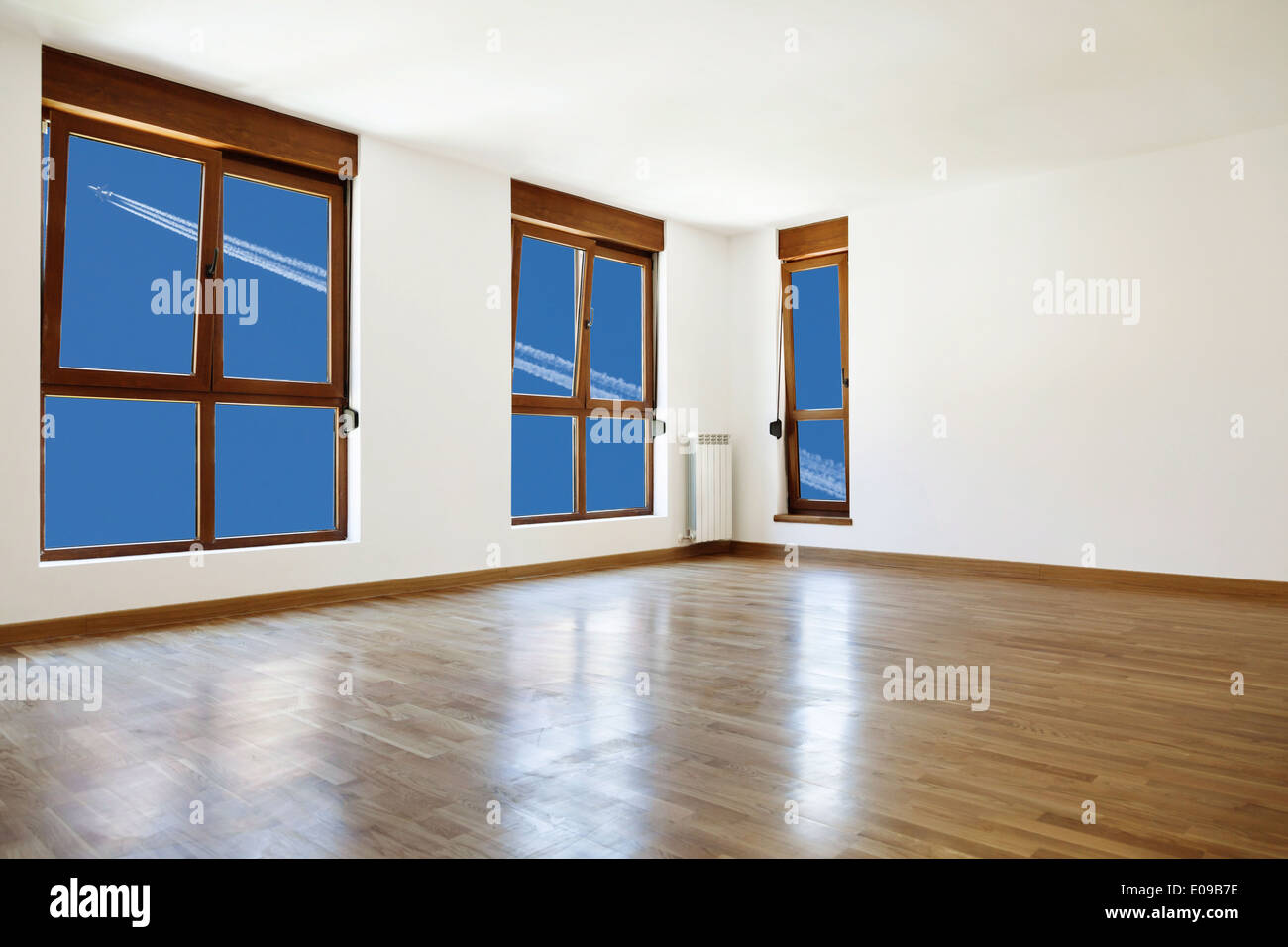 Empty interior room and three windows Stock Photo - Alamy