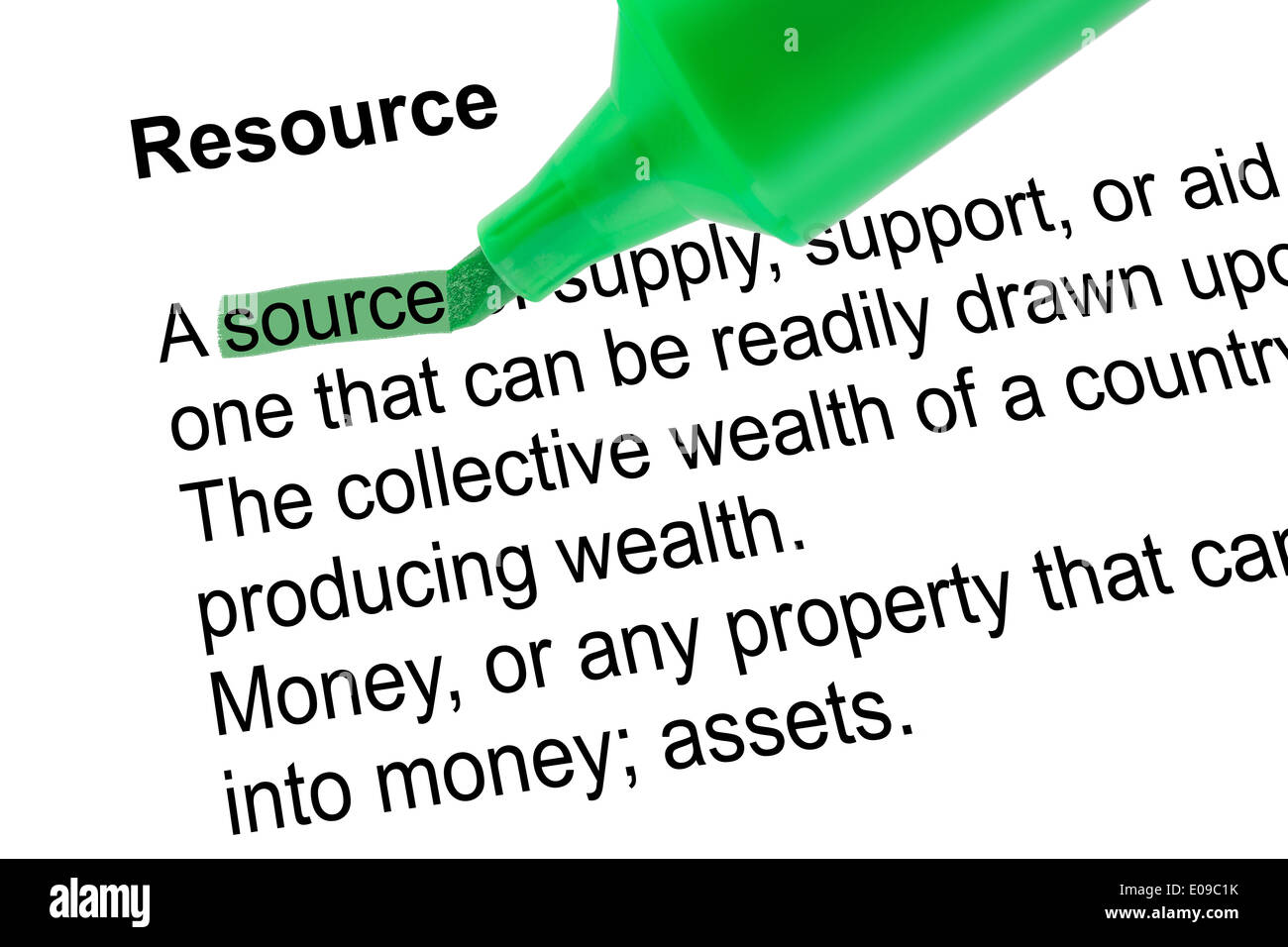 Highlighted word source for Resource with green pen over white paper ...