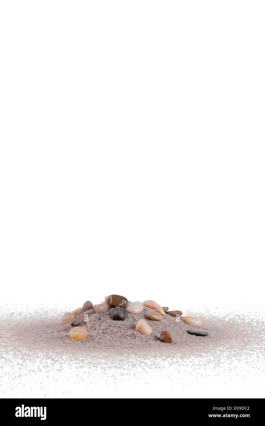 decorative stones buried in sand Stock Photo - Alamy