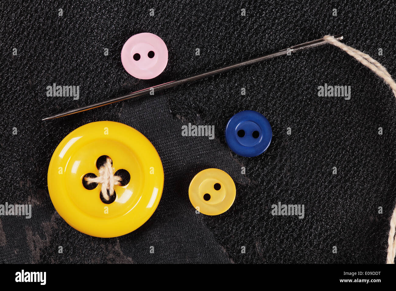 vintage image with some buttons and thread Stock Photo - Alamy