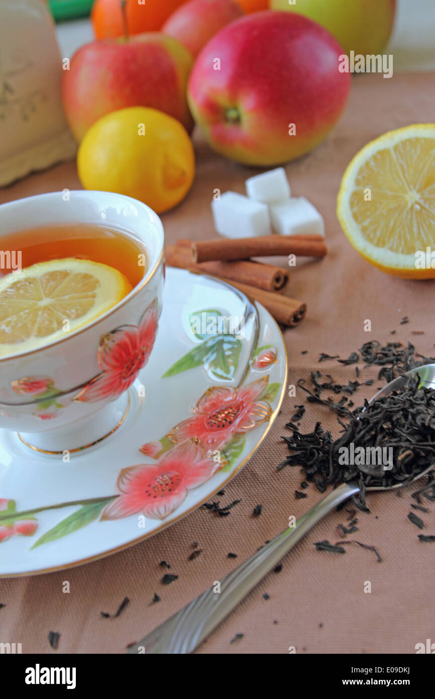 Tea cup with lemon Stock Photo - Alamy