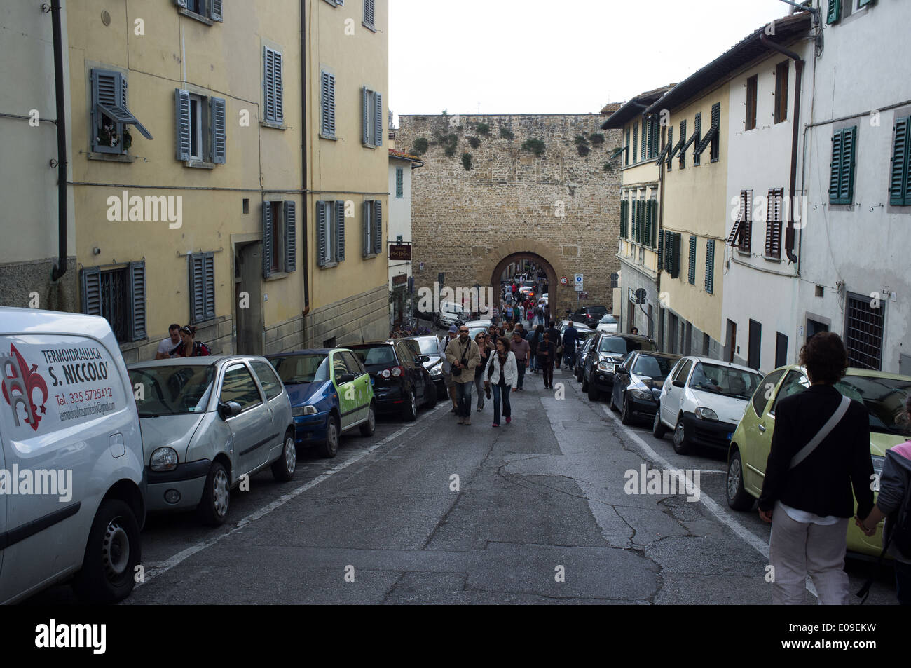A gate in the ancient fortifications on Via di Belvedere allows ...