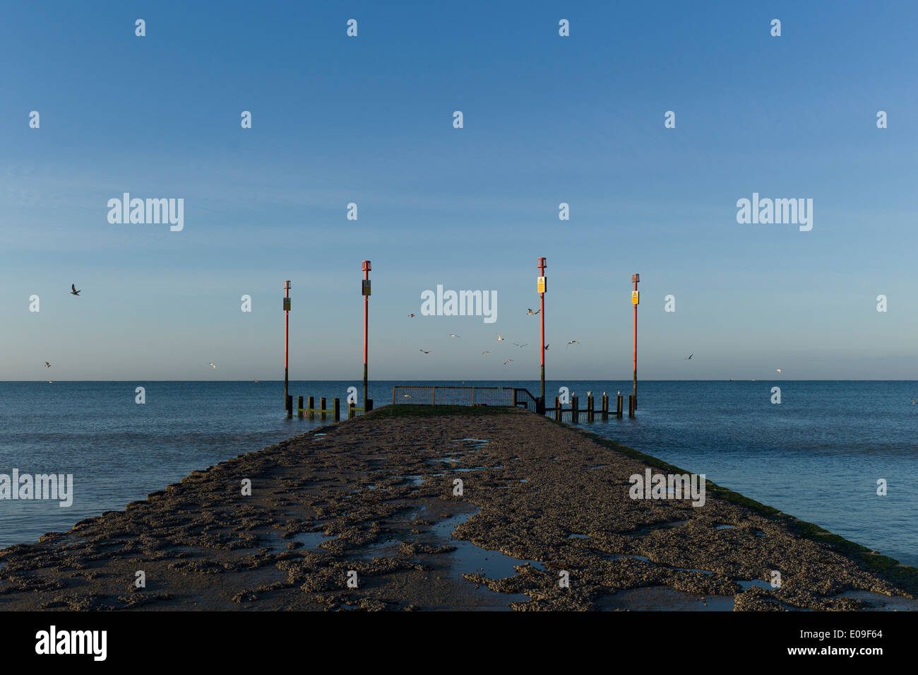 marker posts,outfall power station,Southwick,Sussex Stock Photo - Alamy