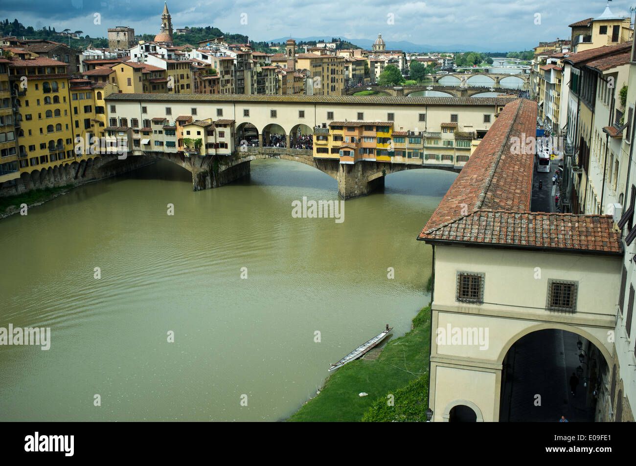 A westward view of the Arno River displaying Florence's bridges ...