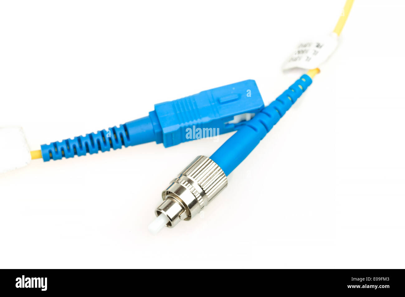 blue fiber optic SC connector and FC type connector on white background ...