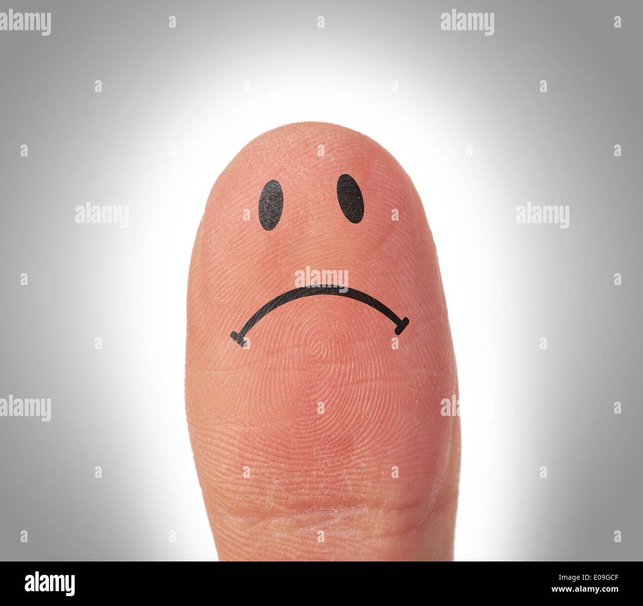 Female thumbs with smile face on the finger being sad Stock Photo - Alamy