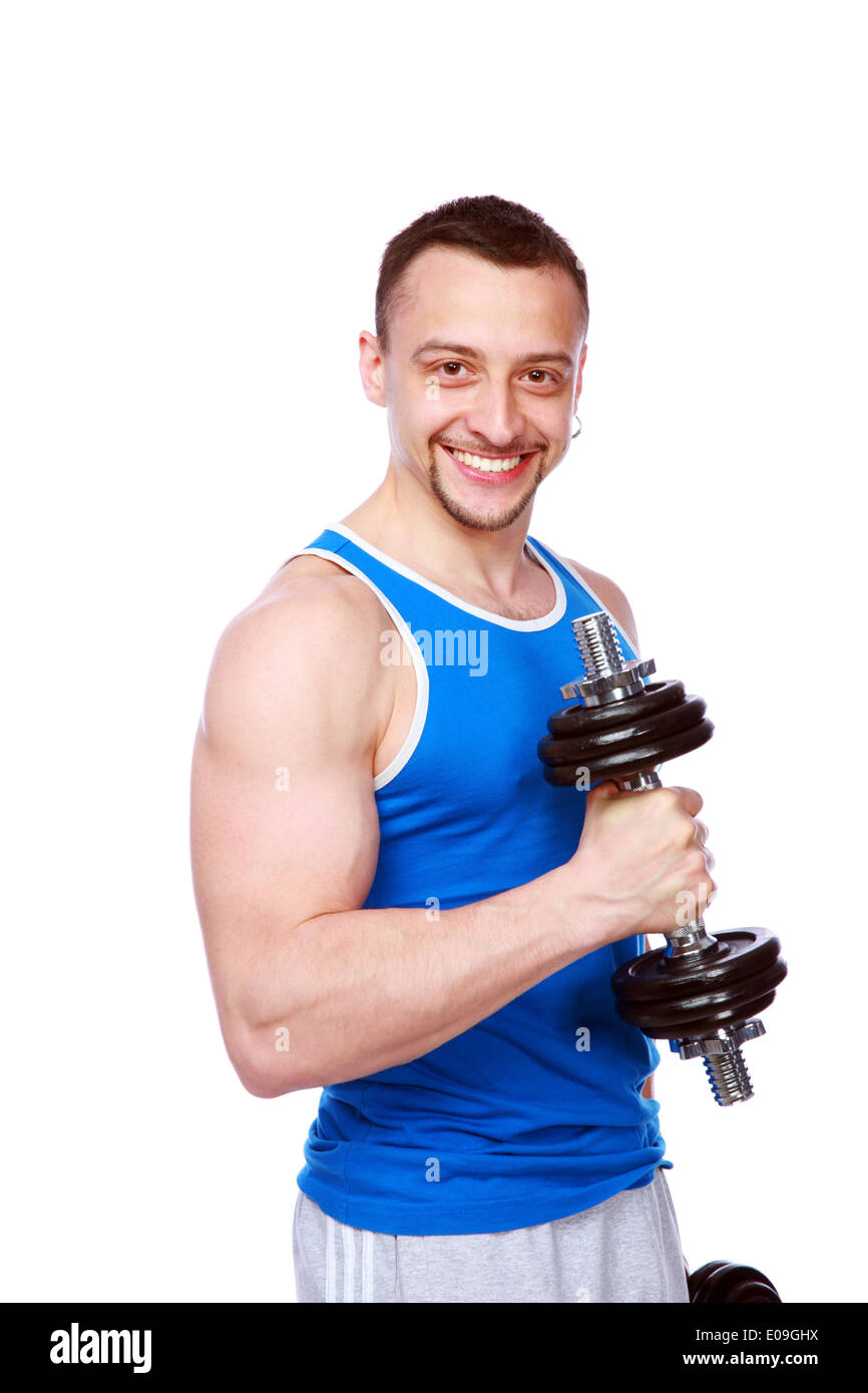 Happy muscular man working out with dumbbells on white background Stock ...