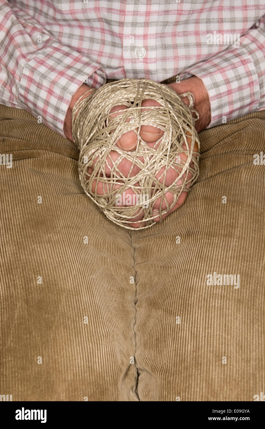 Germany, Man with tied hands Stock Photo - Alamy