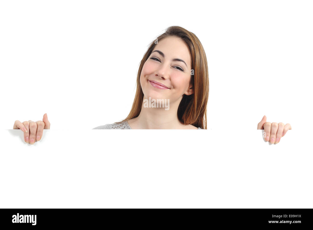 Funny woman presenting and holding a blank sign isolated on a white ...