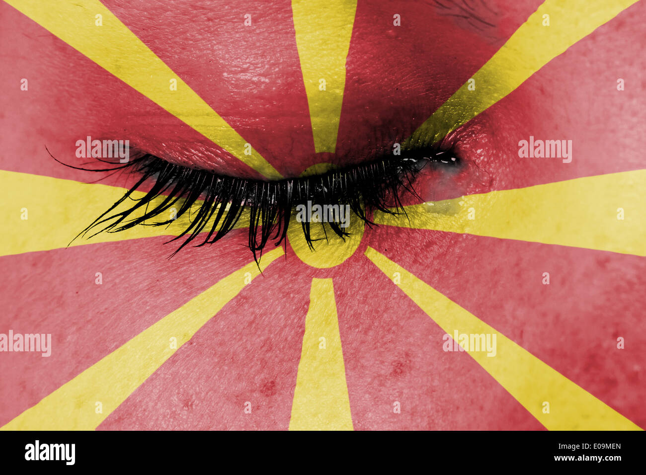 Crying woman pain and grief concept flag of Macedonia Stock Photo - Alamy