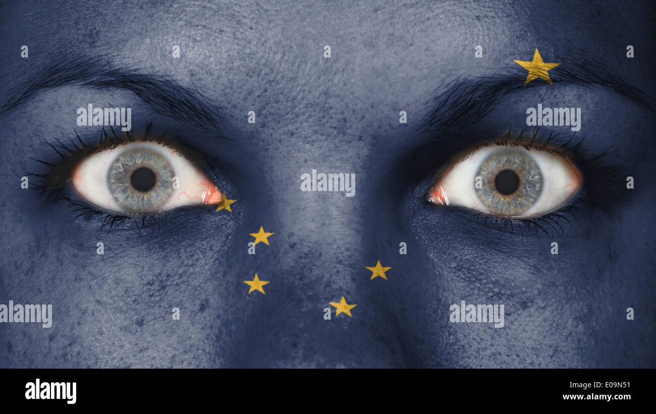 Close up of eyes. Painted face with flag of Alaska Stock Photo - Alamy