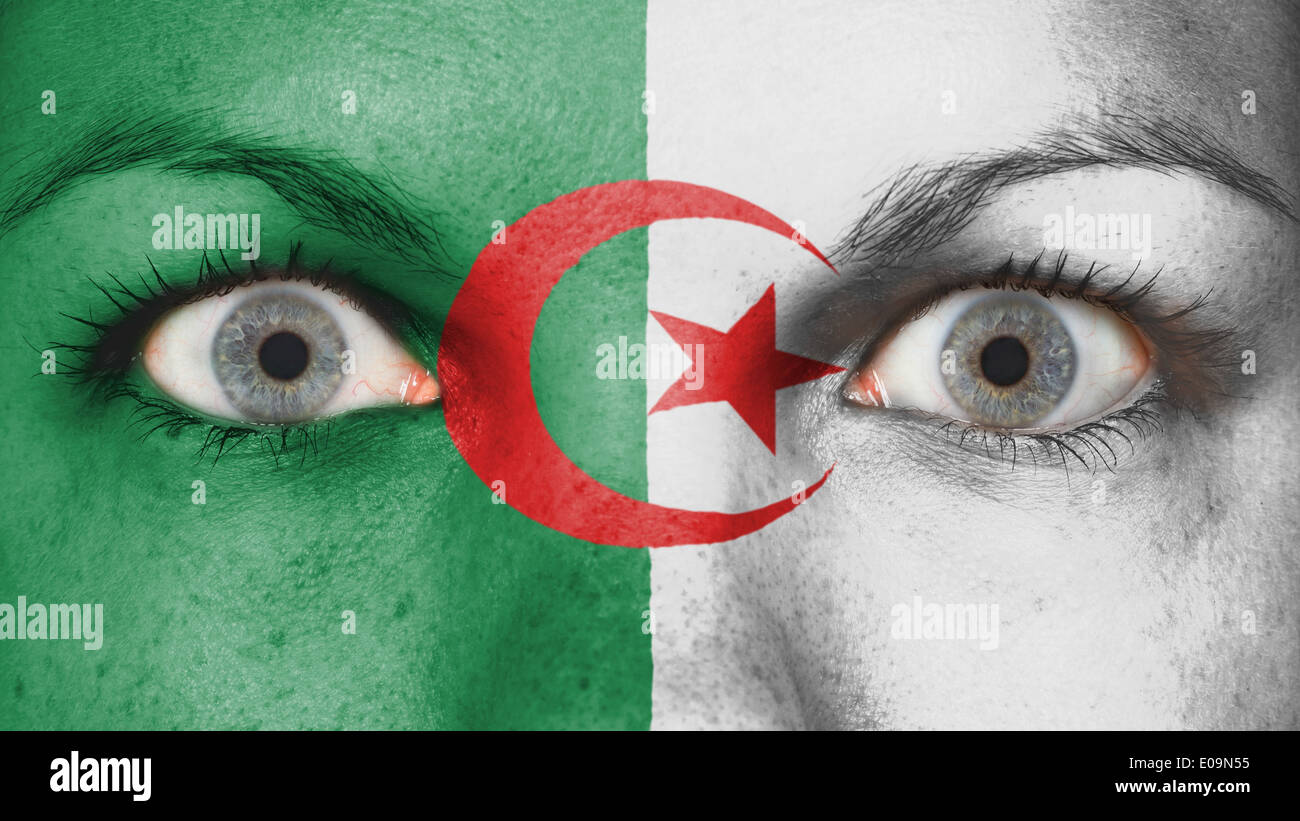 Close up of eyes. Painted face with flag of Algeria Stock Photo - Alamy