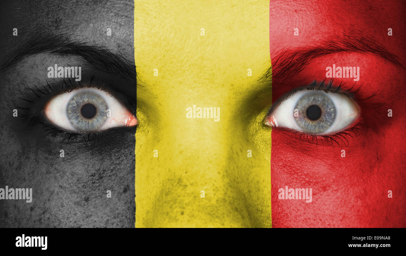 Close up of eyes. Painted face with flag of Belgium Stock Photo - Alamy