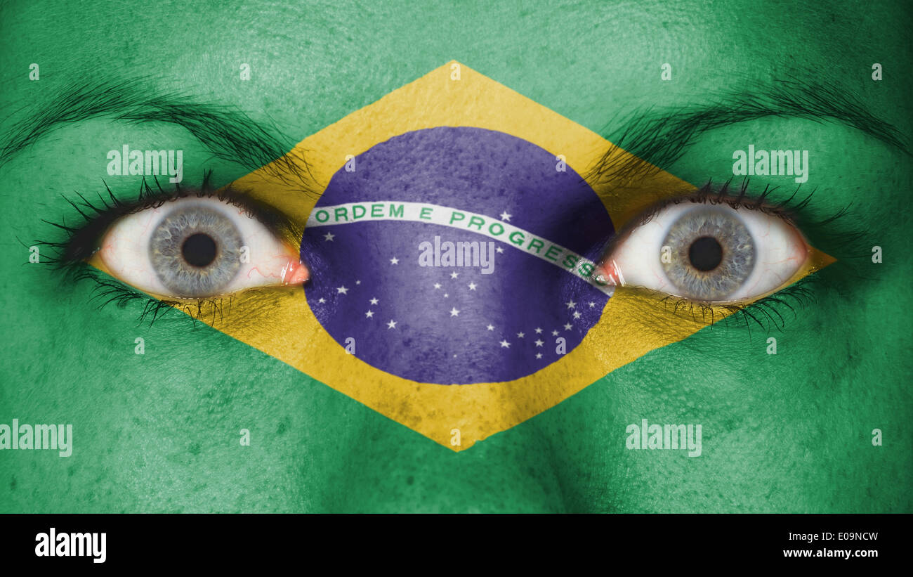 Close up of eyes. Painted face with flag of Brazil Stock Photo - Alamy