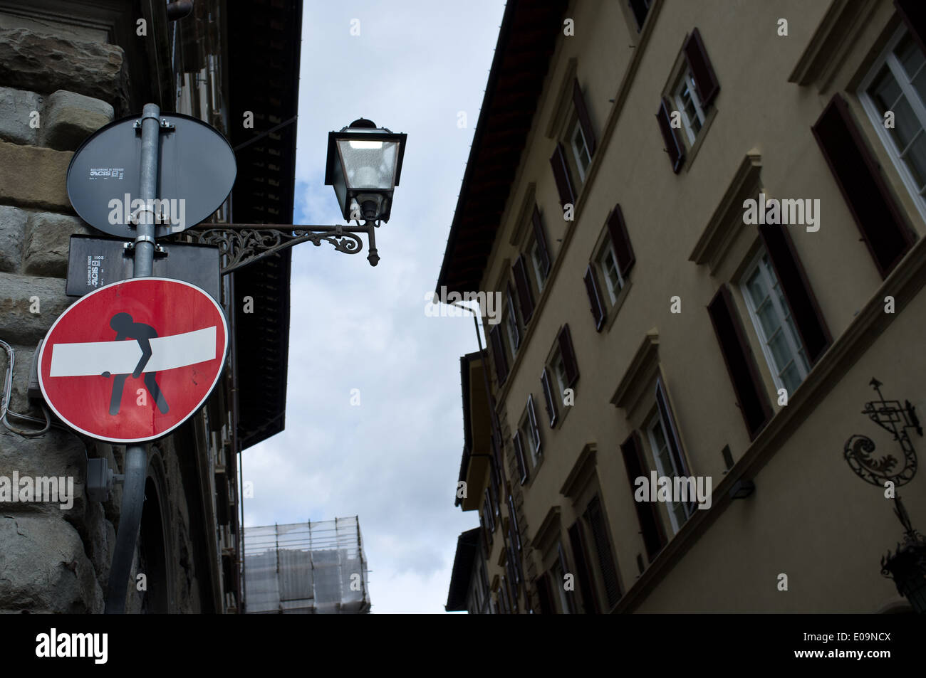 Caricatured street signs direct traffic and decorate the streets of ...