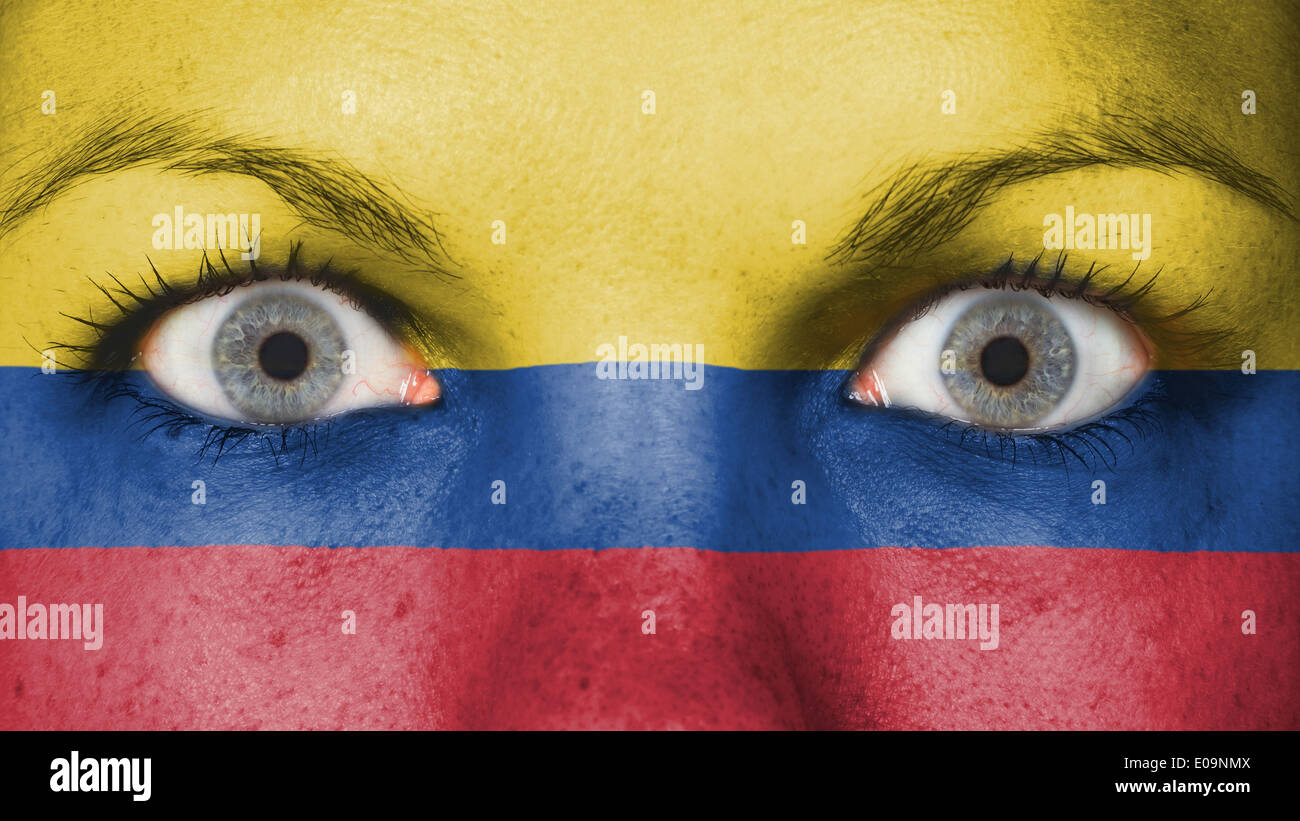 Close up of eyes. Painted face with flag of Colombia Stock Photo - Alamy