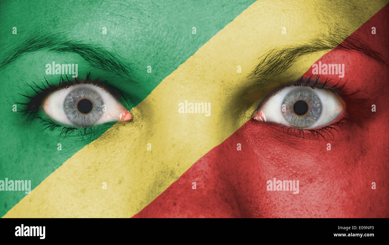 Close up of eyes. Painted face with flag of Congo Stock Photo - Alamy
