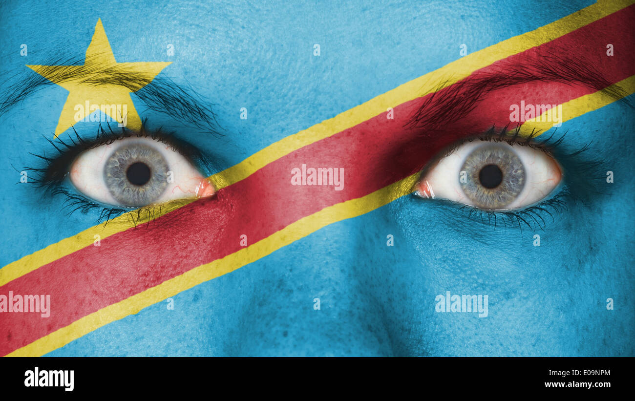 Close up of eyes. Painted face with flag of Congo Stock Photo - Alamy