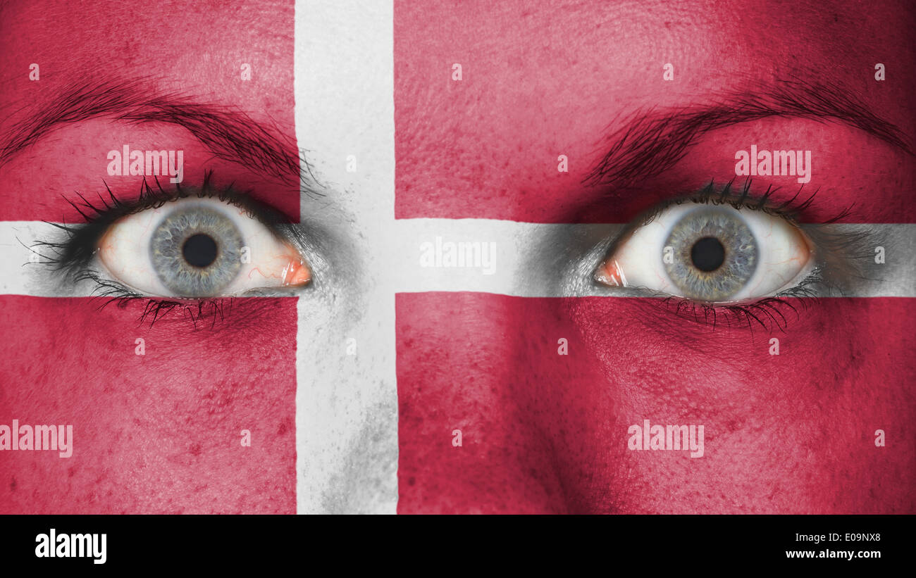 Close up of eyes. Painted face with flag of Denmark Stock Photo - Alamy
