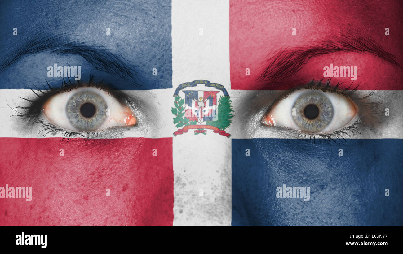 Close up of eyes. Painted face with flag of Dominican Republic Stock ...