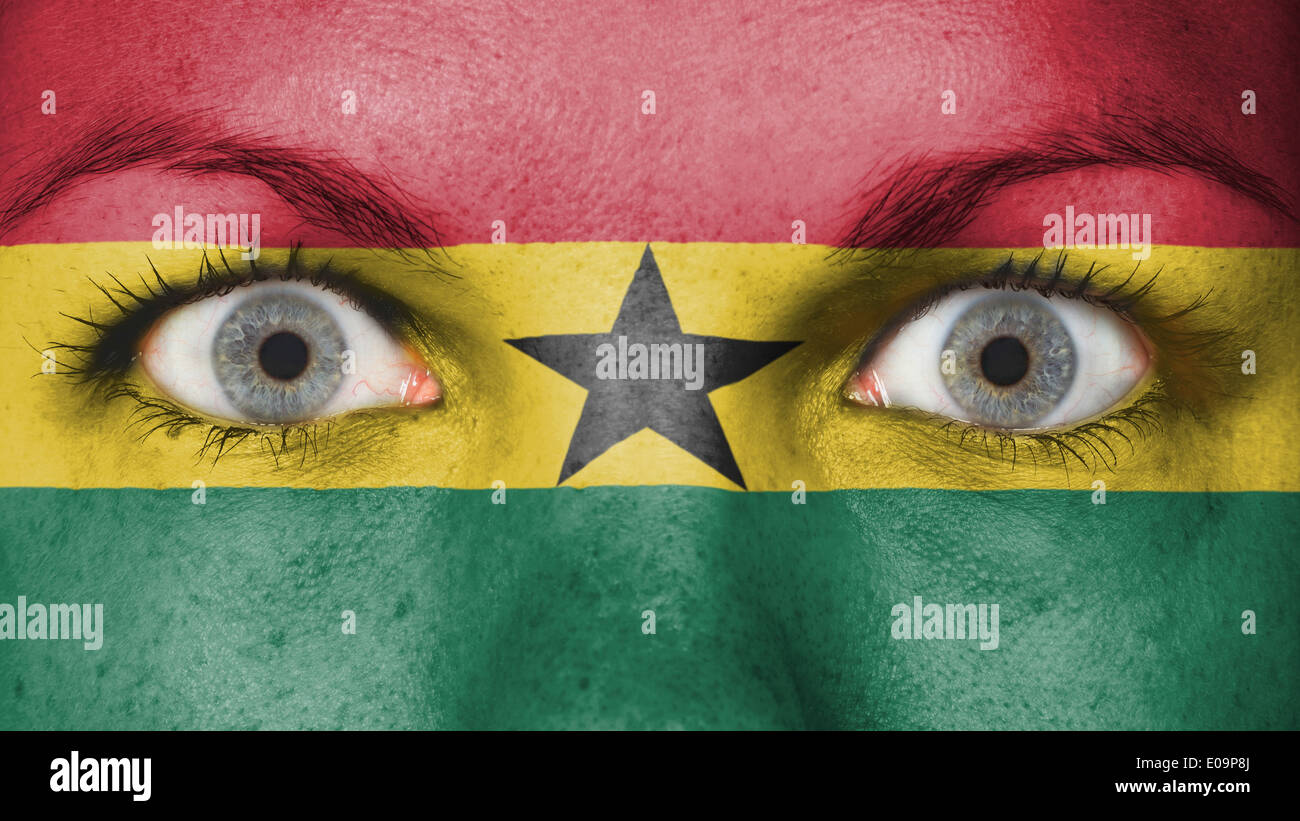 Close up of eyes. Painted face with flag of Ghana Stock Photo - Alamy