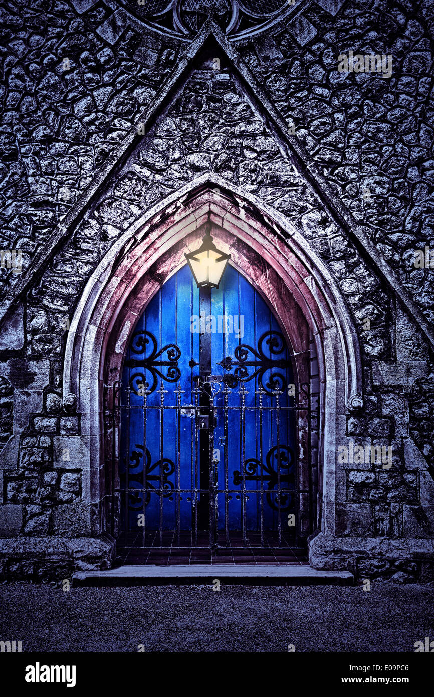 old blue church door with stone surround in essex Stock Photo - Alamy