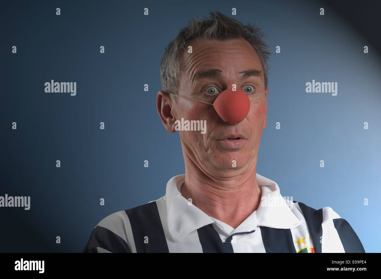 Umpire with clown's nose, studio shot Stock Photo - Alamy