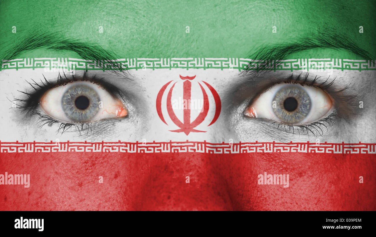 Close up of eyes. Painted face with flag of Iran Stock Photo - Alamy