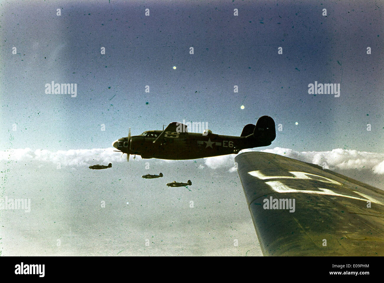 This image features a PV-2 aircraft, part of the E6 and VPML-2 ...
