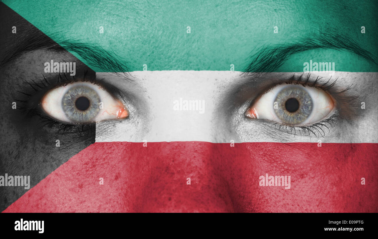 Close up of eyes. Painted face with flag of Kuwait Stock Photo - Alamy