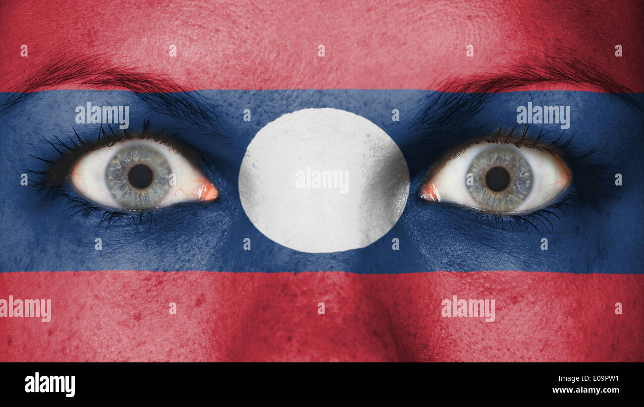 Close up of eyes. Painted face with flag of Laos Stock Photo - Alamy
