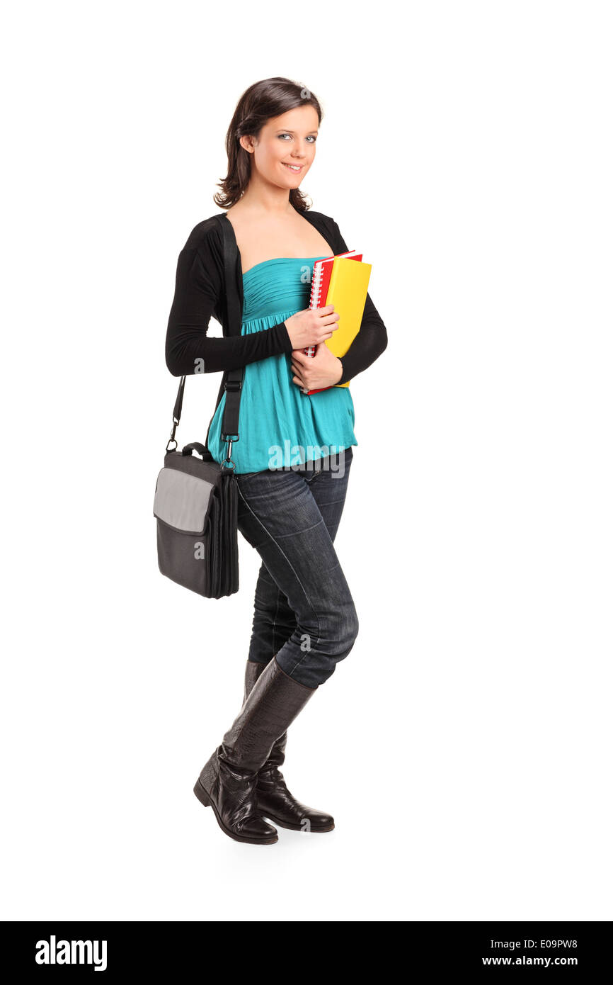 Female student holding notebooks Stock Photo - Alamy